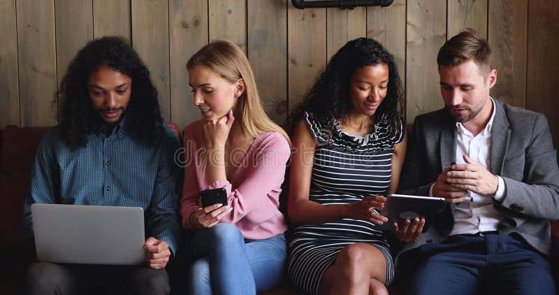 Addicted To Technology Young Diverse People Using Different Devices ...