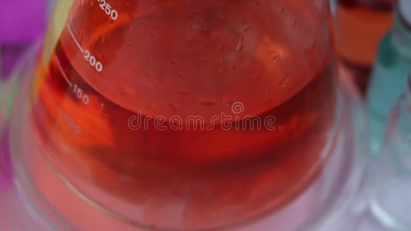 Adding Congo Red Indicator Dye To a Conical Flask with Water. Stock ...