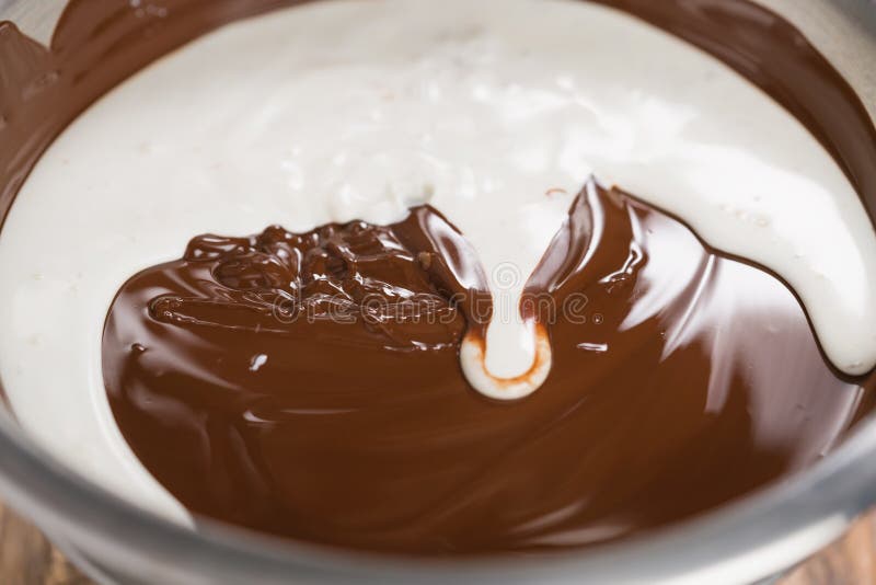 Adding Cream into Melted Chocolate Stock Image - Image of cooking ...