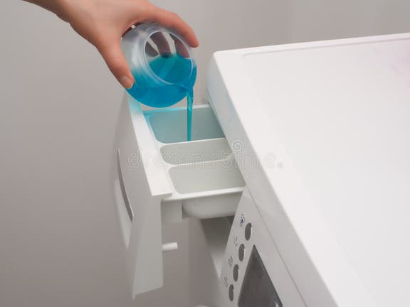 Adding Detergent To Dispenser Stock Photo - Image of machine, fluid ...