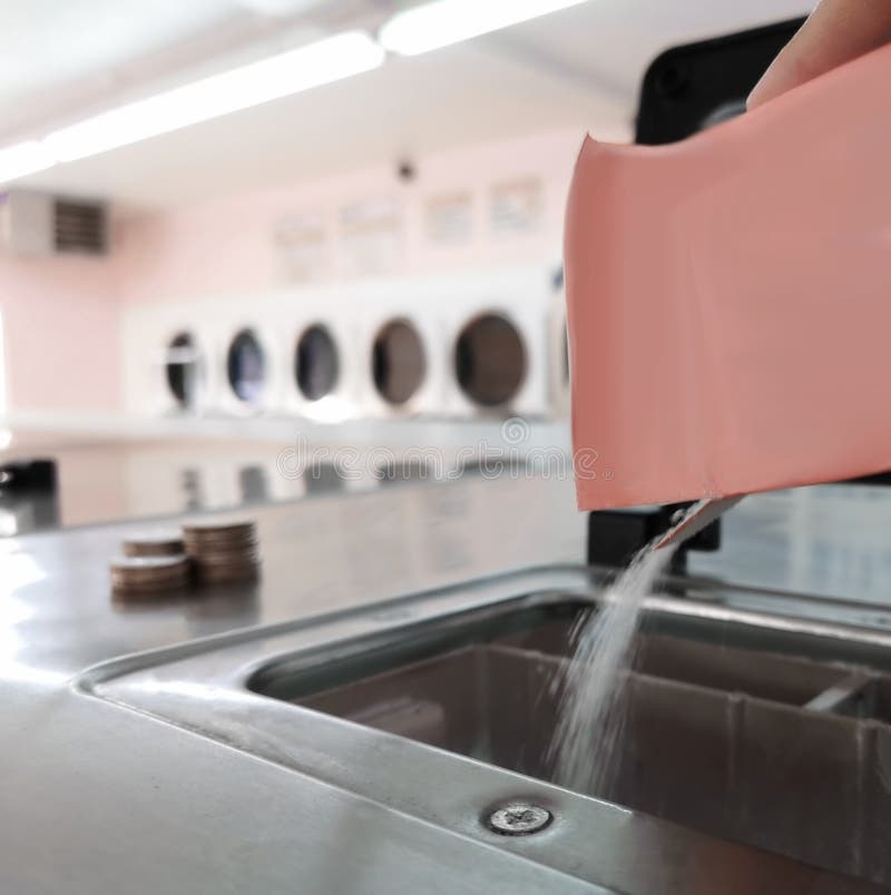 Adding Detergent To Dispenser Stock Photo - Image of machine, fluid ...