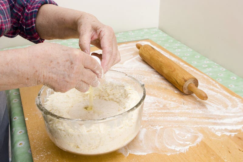Adding an Egg (Recipe Series) Stock Photo - Image of grandma, homemade ...