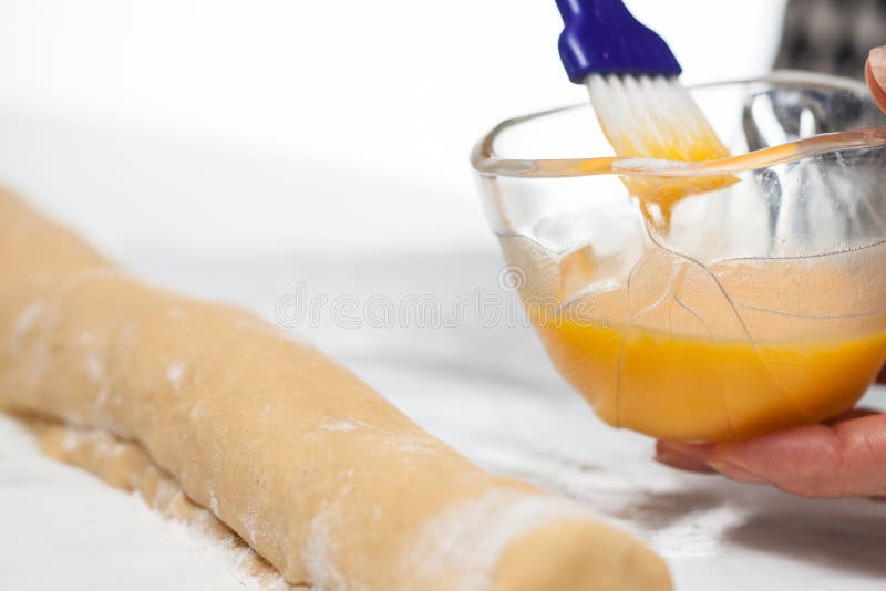 Adding Egg To Rolled Up Strudel Dough Stock Image - Image of ...
