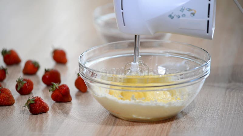Adding Eggs Inside Batter. Stirring the Batter, Close-up. Cooking ...