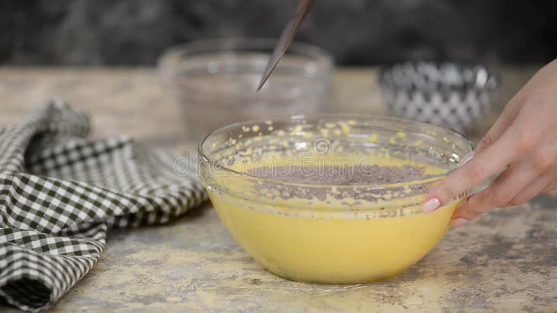 Adding Flour To the Batter. Chef Hands Folding Dry Ingredients To the ...