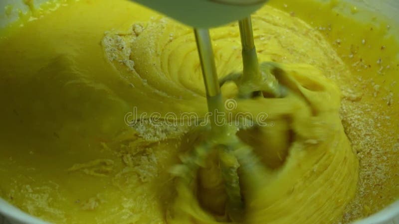 Adding Flour To Beaten Eggs in the Process of Making Cake Via Electric ...