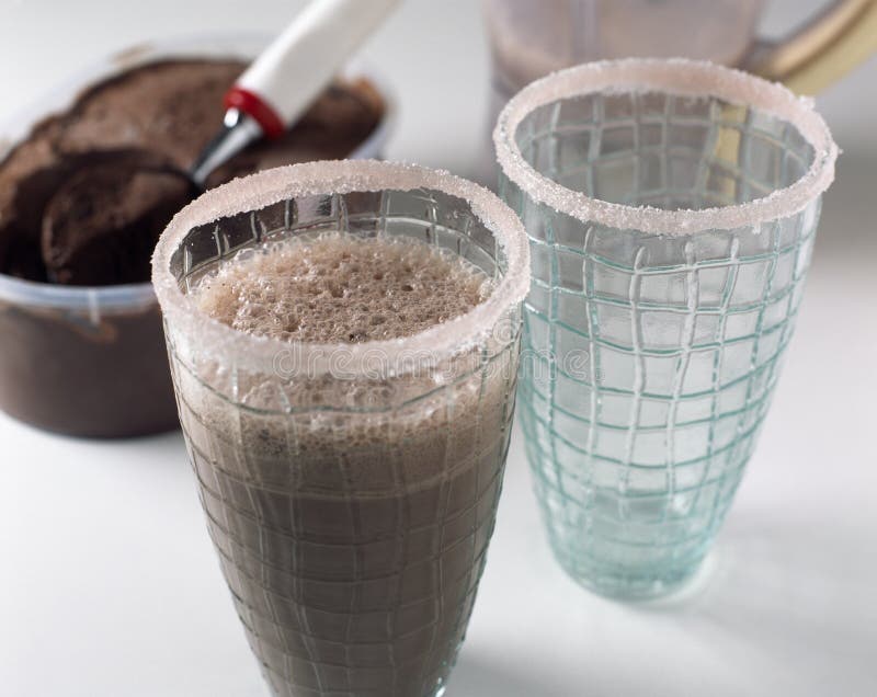 Adding the ice cream stock photo. Image of blend, milkshake - 23704676