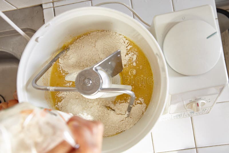 Adding Ingredient To Batter Machine Stock Photo - Image of ingredient ...