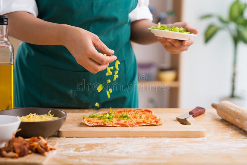 Adding ingredients stock image. Image of cook, plate - 50319683