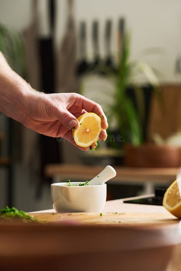 Adding Lemon Juice into Mortar Stock Image - Image of citrus, sauce ...