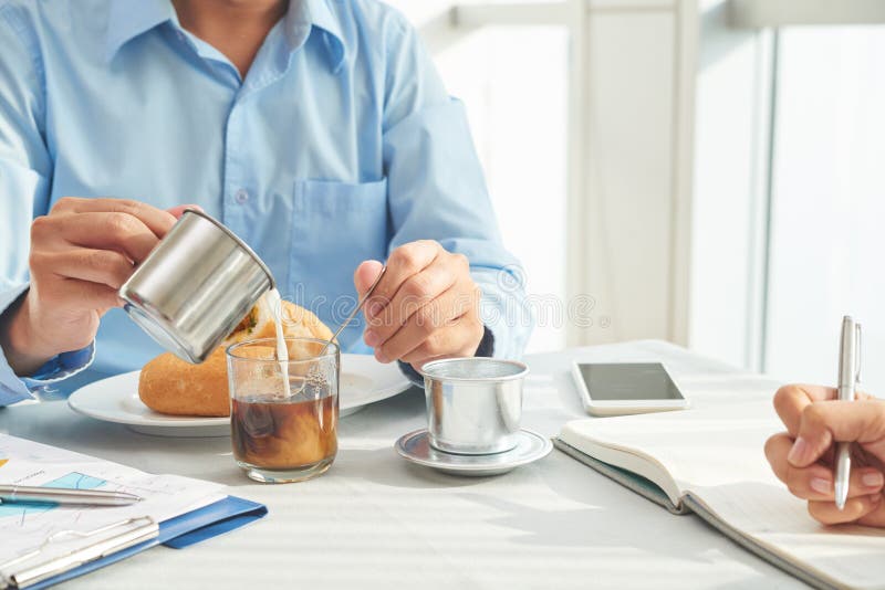 Adding milk stock image. Image of adding, filling, coffee - 90538595