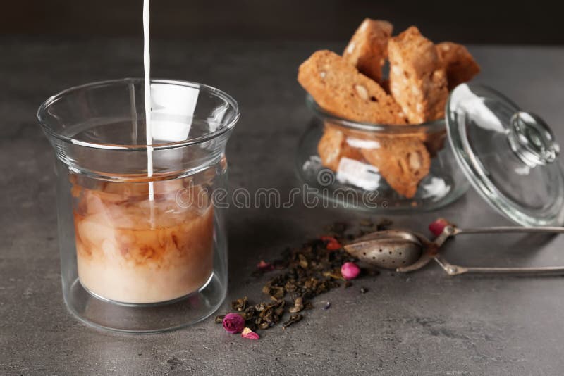 Adding Milk To Hot Aromatic Tea Stock Image - Image of snack, cream ...