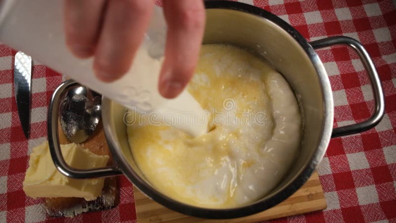 Adding milk to pot stock footage. Video of dairy, ingredient - 266865090