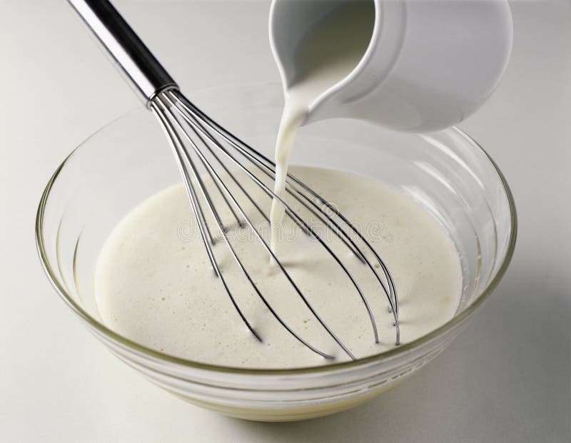 Adding the Milk To Rhe Bowl Stock Photo - Image of dessert, dish: 23705570