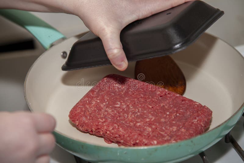 Adding More Ground Beef stock photo. Image of dine, culinary - 206223096