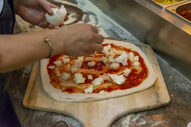 Adding Mozzarella Cheese To a Pizza Stock Image - Image of ingredient ...
