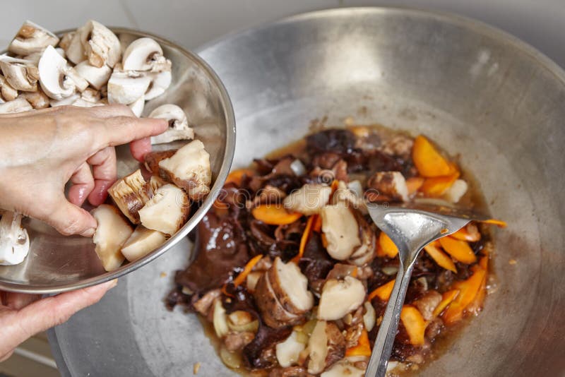 Adding mushroom stock image. Image of carrot, ingredient - 52204731