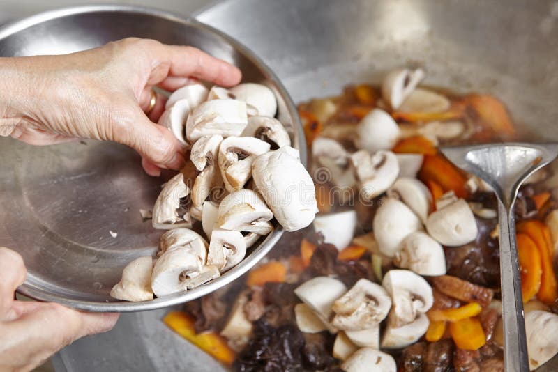 Adding mushroom stock photo. Image of mushroom, stir - 52206276