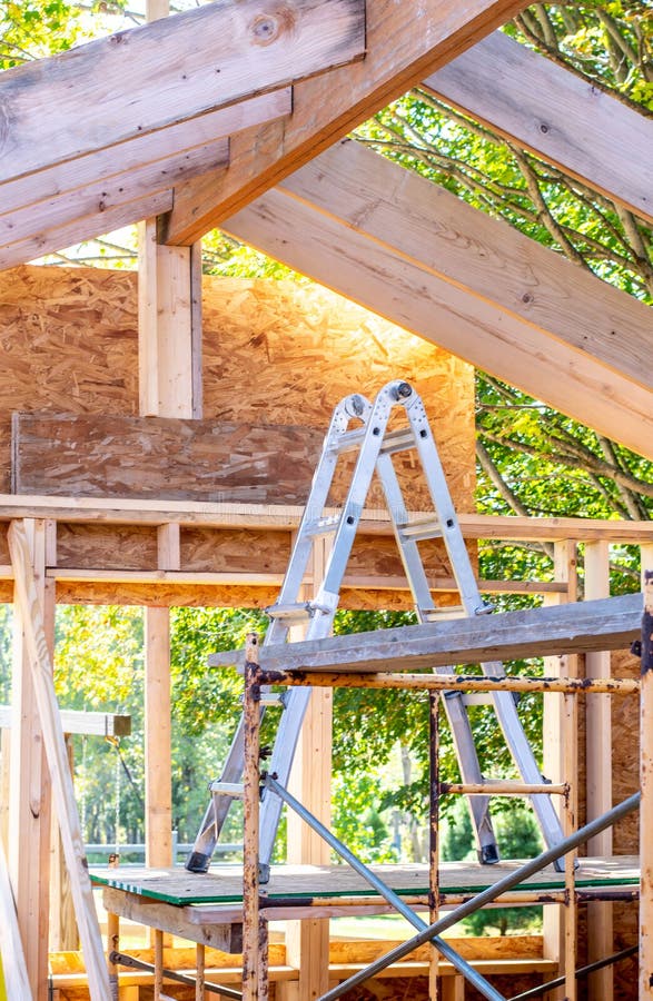 Adding a room onto a home stock photo. Image of plank - 244697980