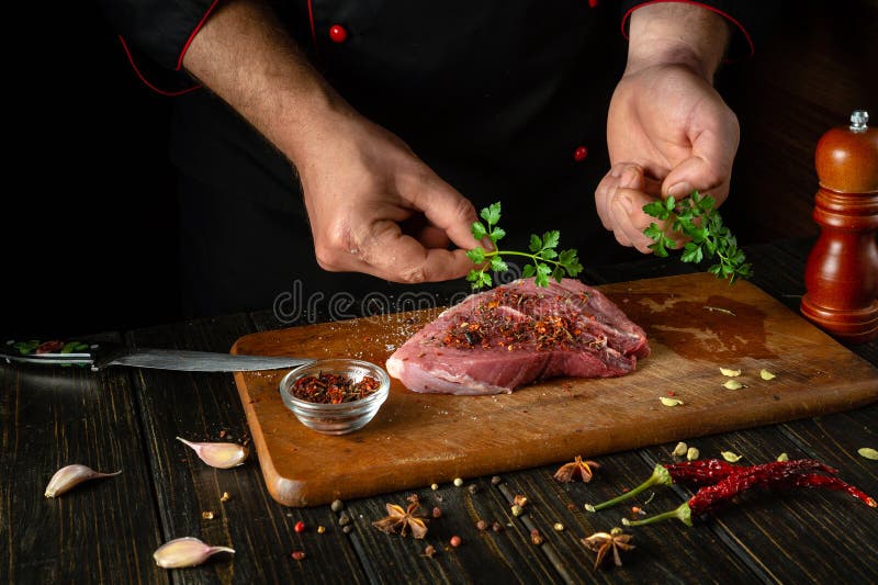 Adding Parsley To Meat by the Chef Hands for Aroma and Taste. Cooking ...