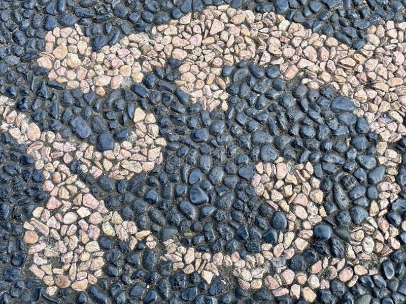Multi Colored Pebbles Design Imbedded in Concrete Pavement Stock ...
