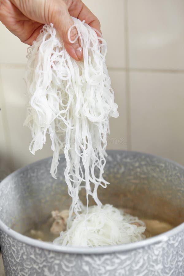 Adding rice noodle stock photo. Image of kitchen, home - 53497256