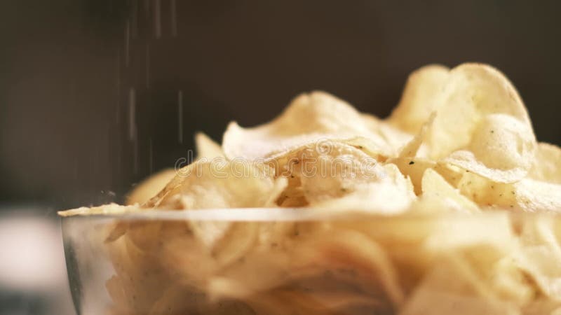 Adding Salt on Potato Chips. Stock Footage - Video of snack, meal ...