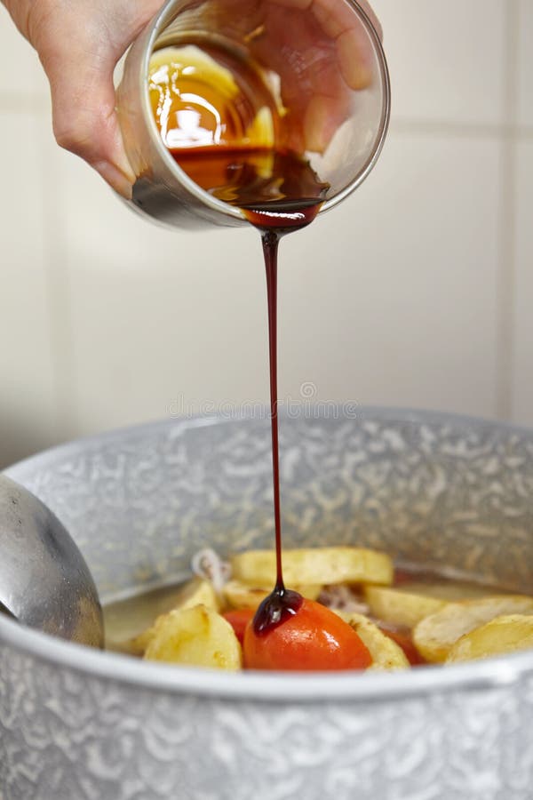 Adding sauce stock image. Image of potato, glass, tomato - 53498529