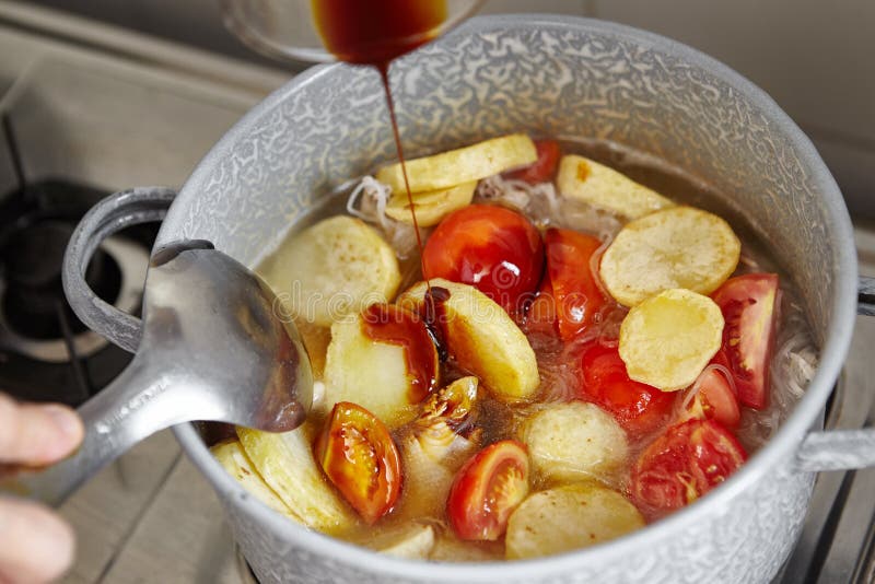 Adding sauce stock image. Image of food, sweet, soup - 53498857