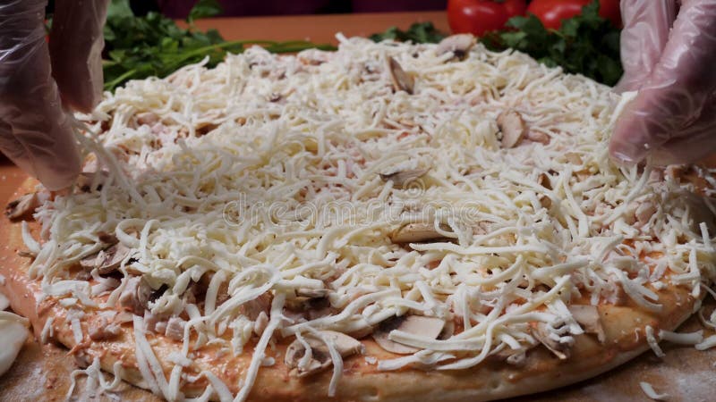 Adding Sauce. Italian Pizza Preparation. Frame. Cheese Being Spread on ...