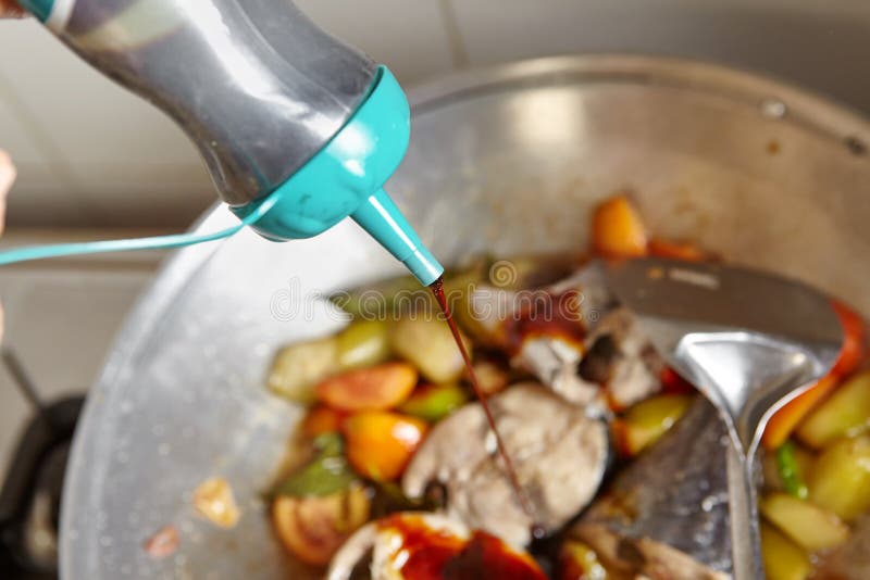 Adding sauce stock photo. Image of spatula, kitchen, cooking - 51200524