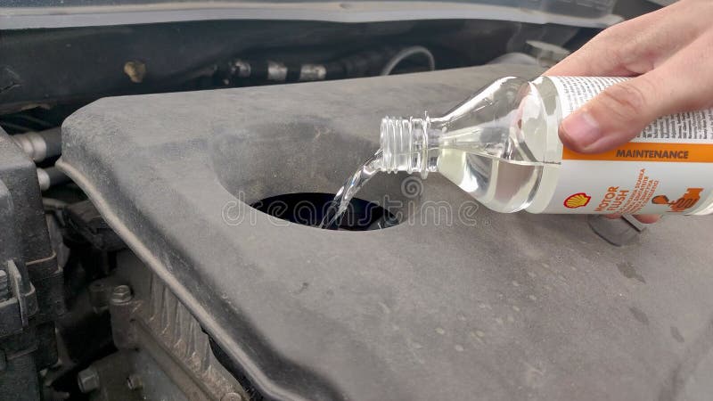 Adding Shell Motor Flush To Car Engine. Stock Footage - Video of shell ...