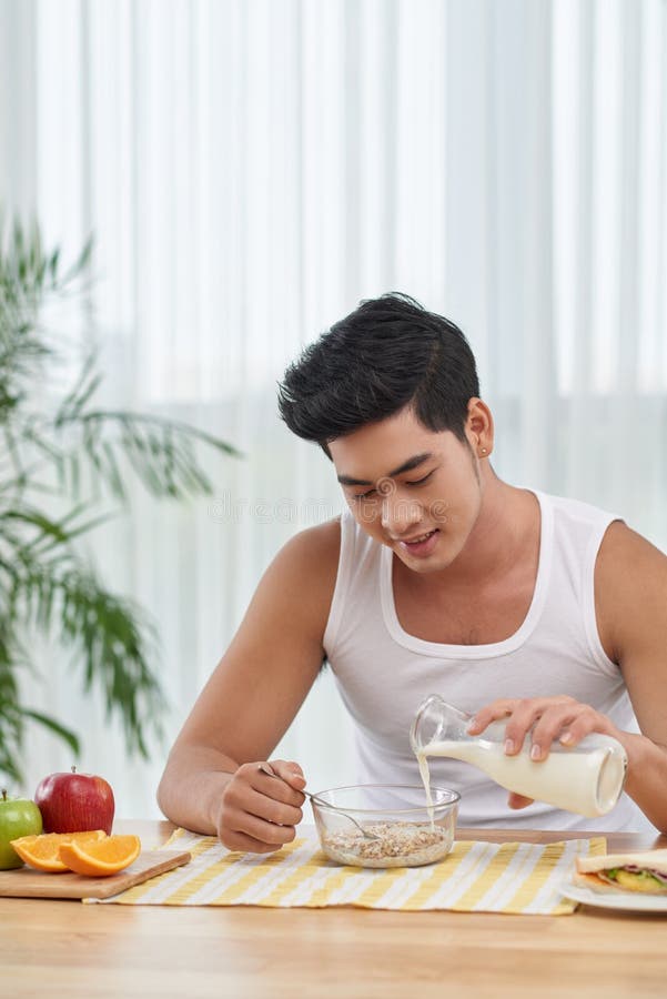 Adding some milk stock image. Image of drink, milk, muesli - 69075199