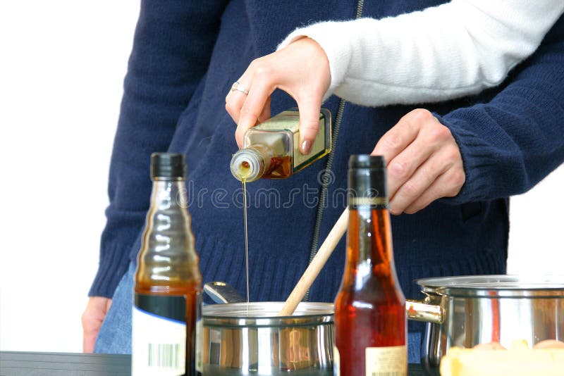 Adding some oil stock photo. Image of portrait, happiness - 318532