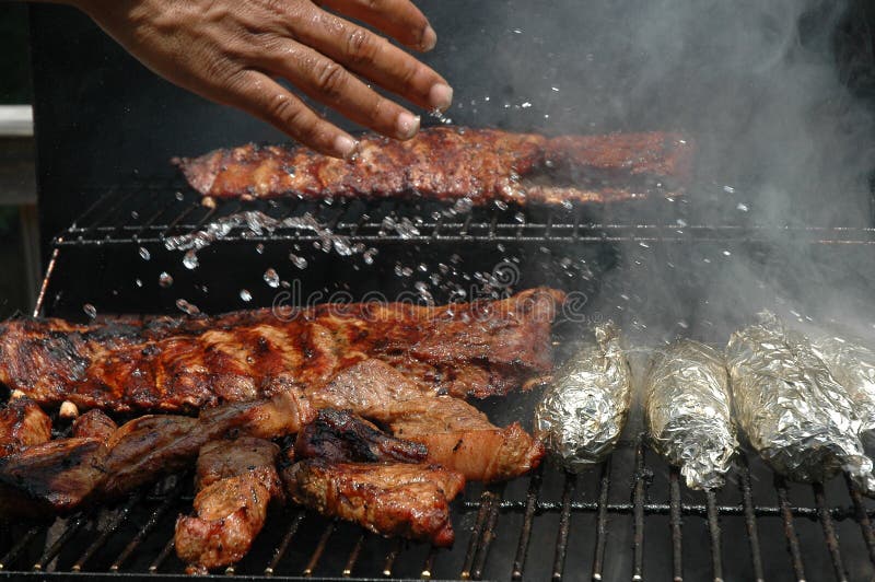 Adding Spice stock image. Image of cook, cookout, meat - 5393131