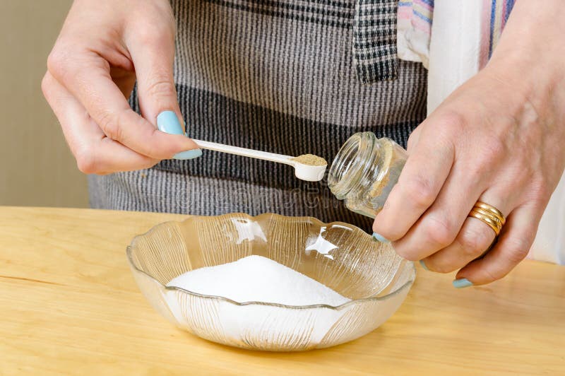 Adding spice stock image. Image of female, measure, adding - 43895965