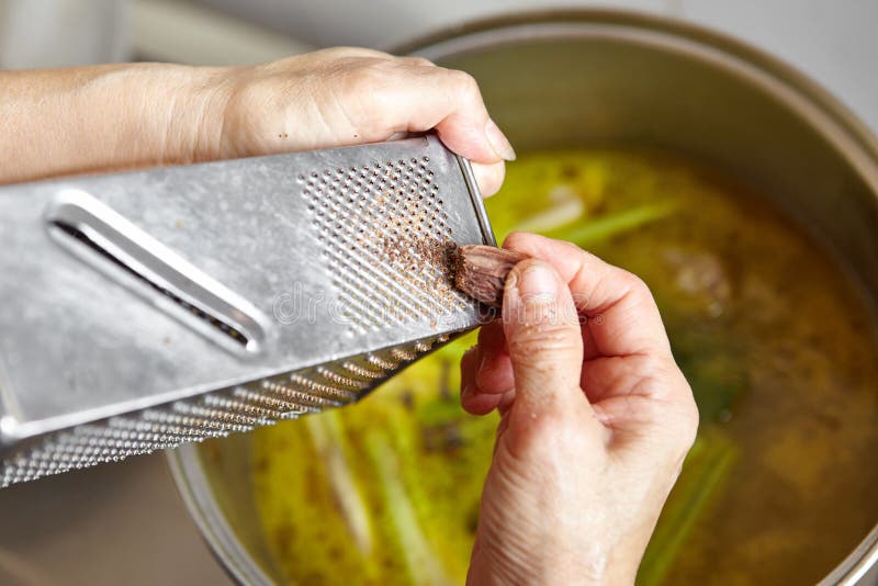 Adding spices and herbs stock image. Image of ingredient - 53508983