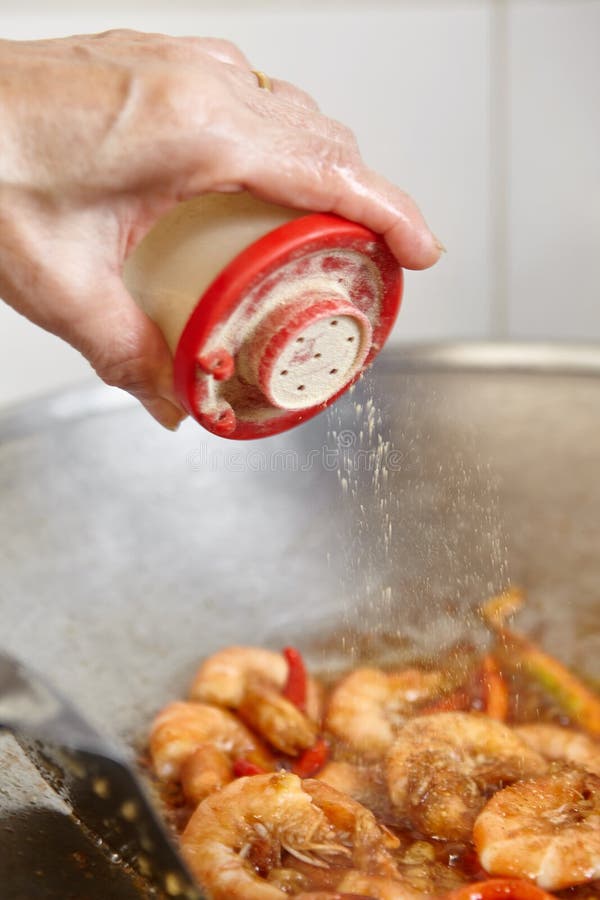 Adding spices stock photo. Image of preparation, hand - 55075082