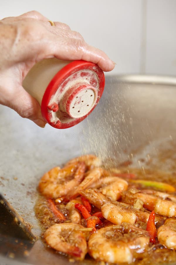 Adding spices stock image. Image of cooking, home, preparation - 55075409