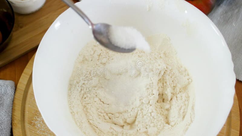 Adding Spices To Flour. Preparing a Baking Mixture Stock Video - Video ...