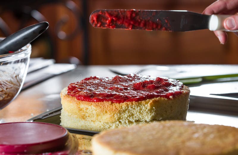 Adding strawberry puree stock image. Image of flavour - 174003765