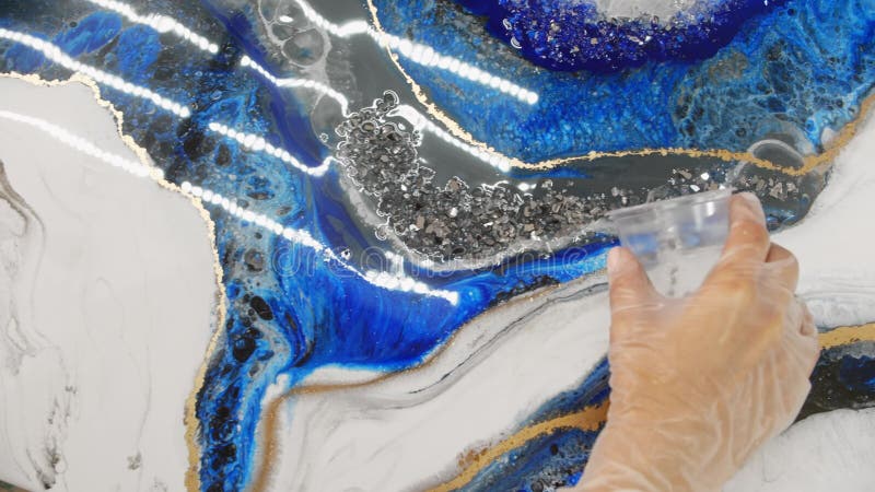 Adding Texture To an Epoxy Resin Painting Stock Footage - Video of ...