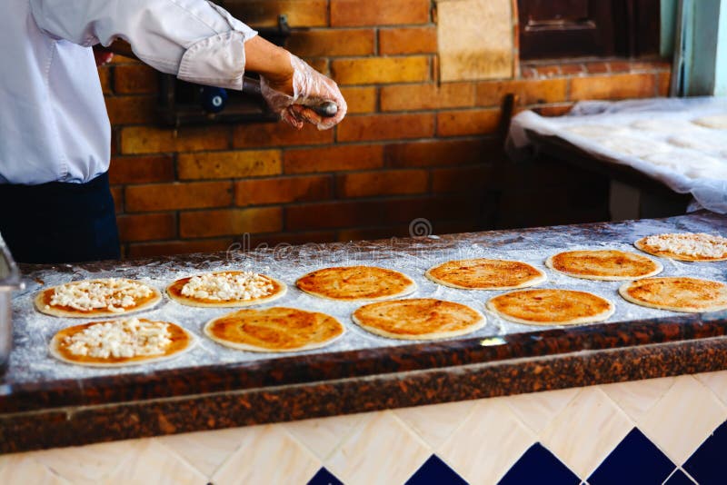 Adding Tomato Sauce To Pizza Base Stock Image - Image of cook, hobby ...