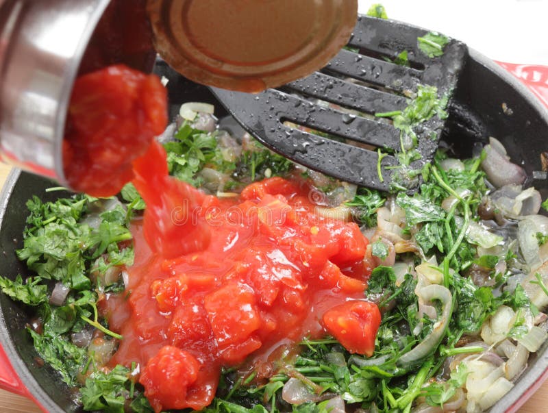 Adding Tomatoes To Parsley and Onion Stock Photo - Image of parsley ...