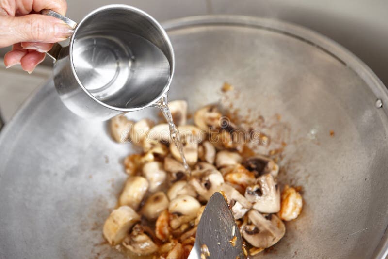 Adding water stock photo. Image of tofu, chef, stir, cook - 55076038