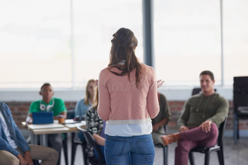 Addressing Her Group. Rearview Shot of Young University Student ...