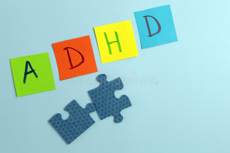 ADHD Abbreviation on Multi-colored Paper and Puzzle Pieces. Attention ...
