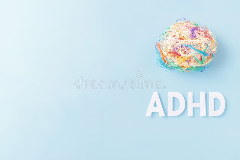 ADHD Concept with Colorful Tangled String Ball on Blue Background Stock ...