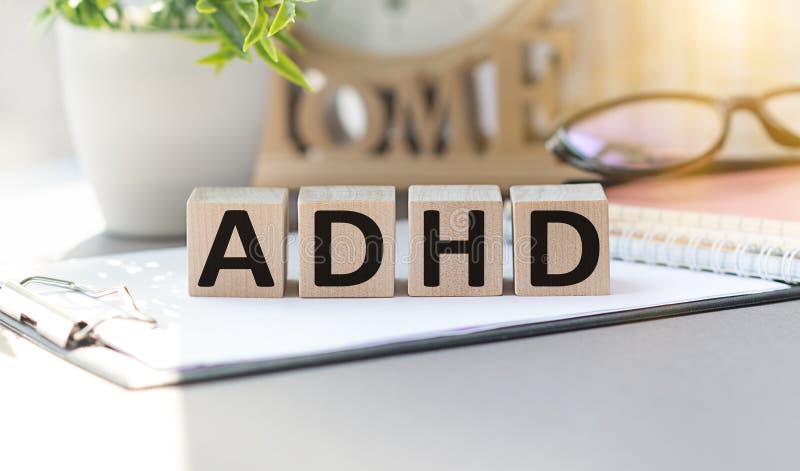 ADHD Text on Wooden Cubes Standing in a Row on Office Papers. Stock ...
