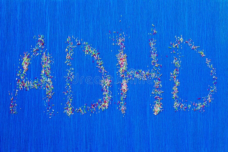 ADHD Written with Pastry Sprinkles on a Blue Background. ADHD is ...